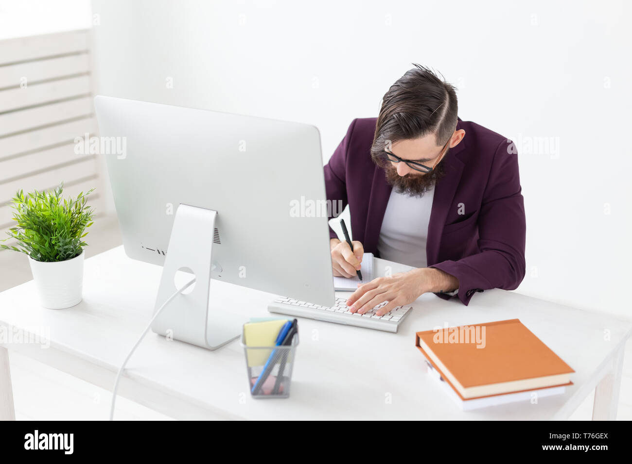 people, design and style concept - graphic designer sketching new ...