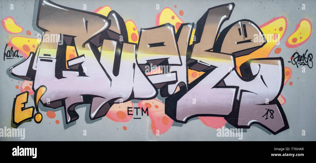 Graffiti detail on the textured wall Stock Photo - Alamy