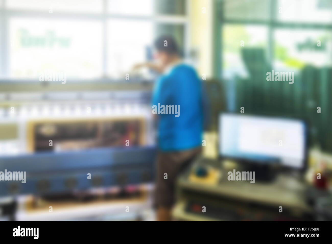Blur scene worker during production inkjet printer machine Stock Photo ...
