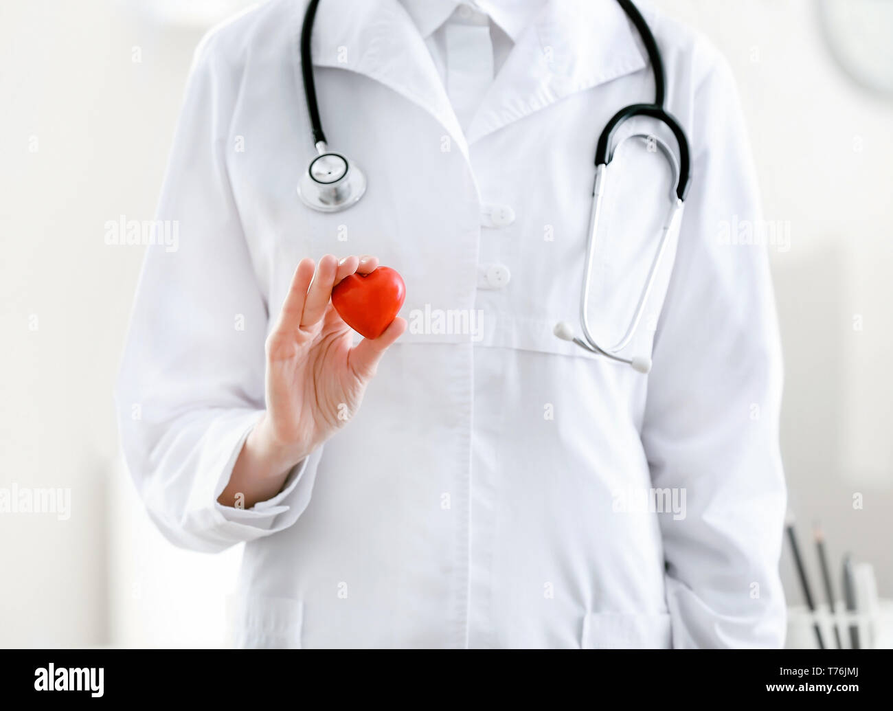 Female staff in red uniform hi-res stock photography and images - Alamy
