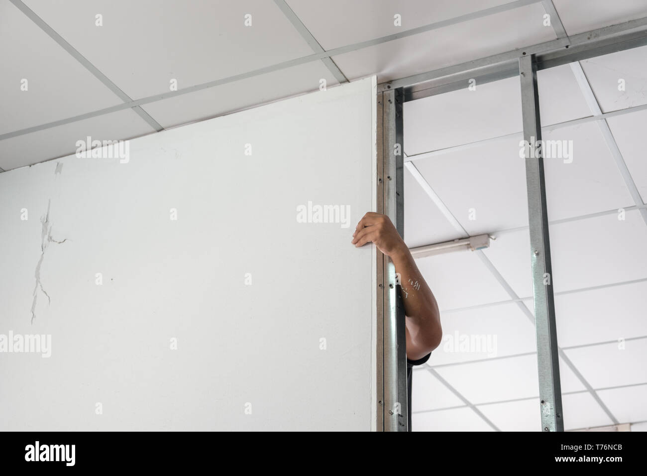 Workers dismantled smart wood partition wall and ceiling Stock Photo ...