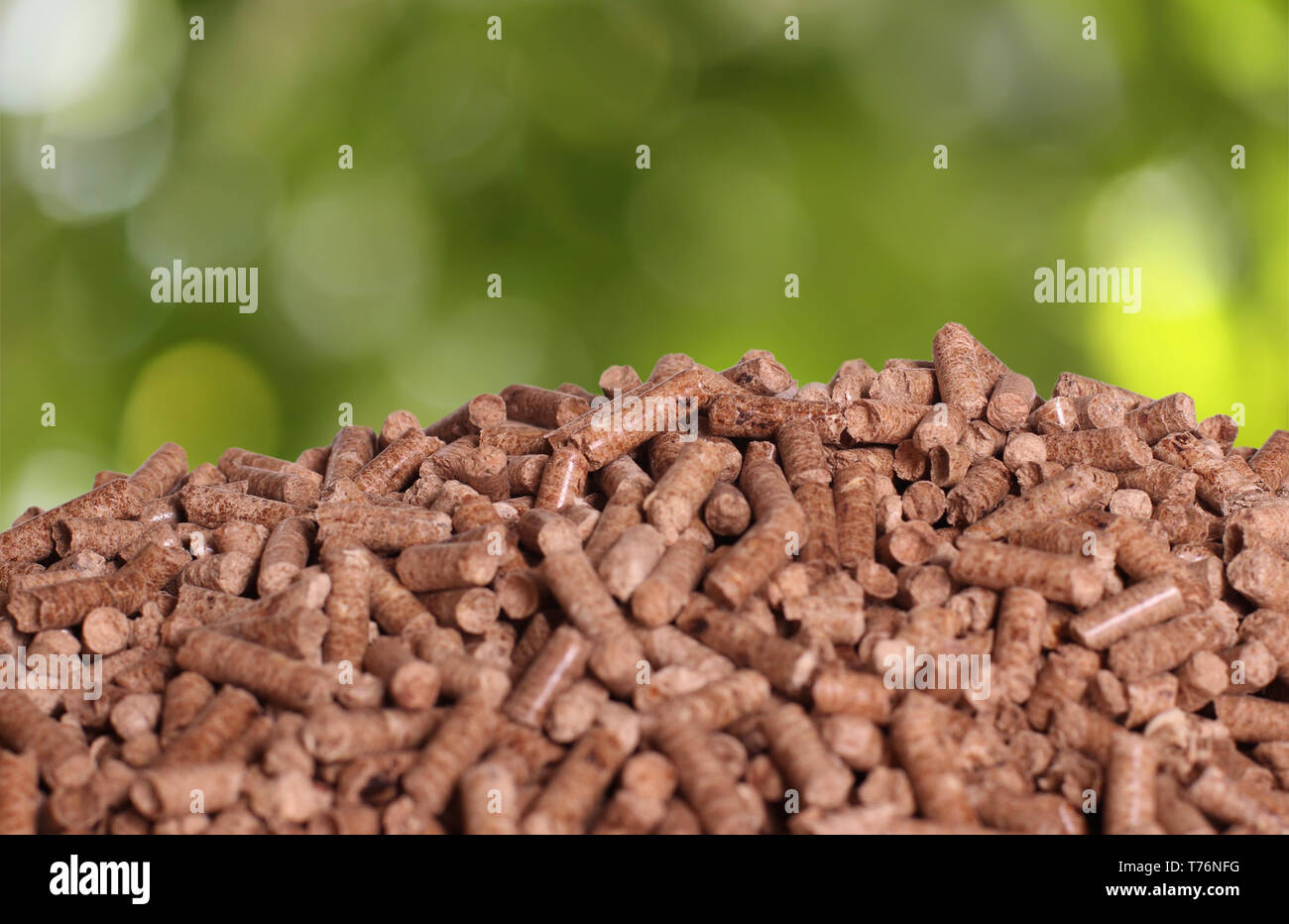 Natural wooden pellets Stock Photo - Alamy
