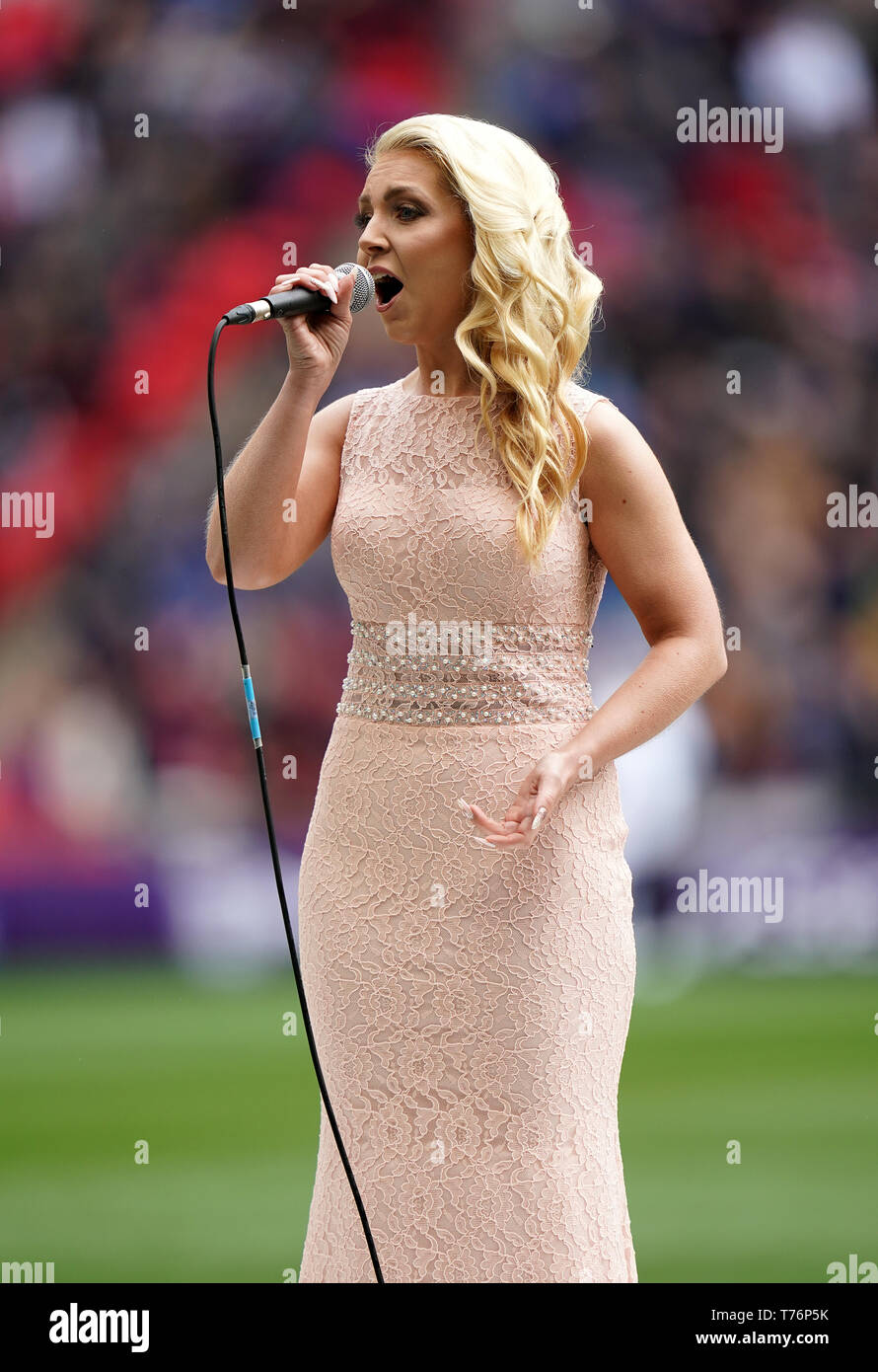 Singer Emily Haig sings the national anthem ahead of the the Women's FA ...