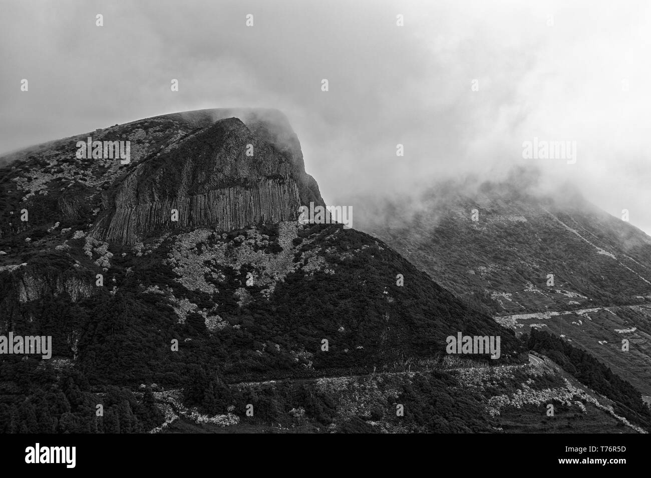 The Rocha dos Bordoes basalt formation in black and white on Flores ...