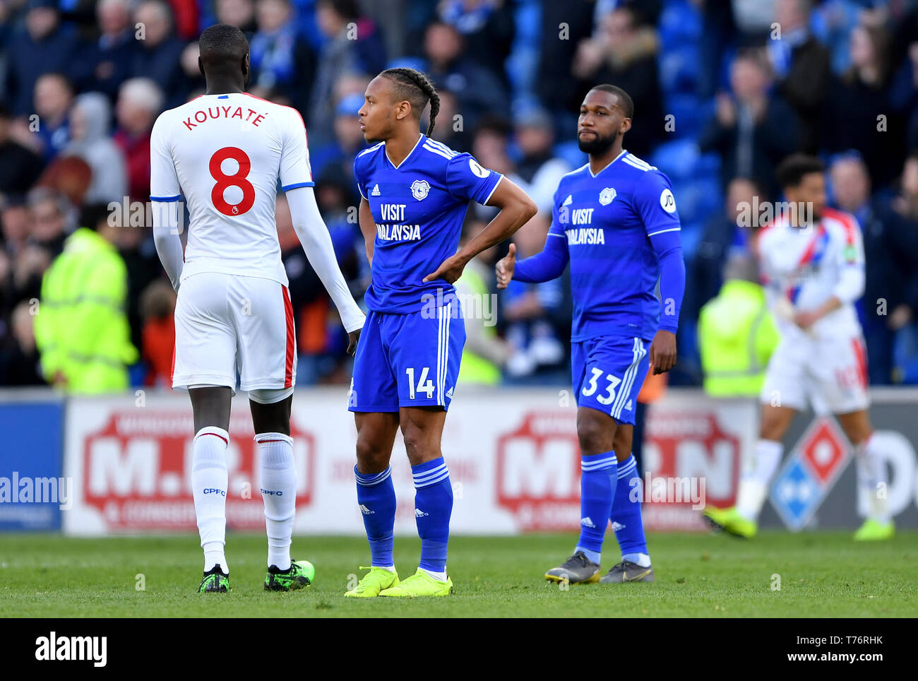 Cardiff City's Bobby Reid (centre) appears dejected after his team are ...