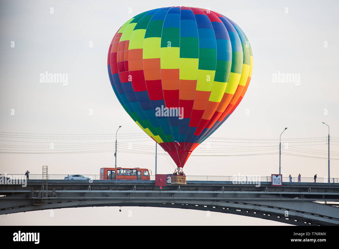 thermal balloon flying near a bridge Stock Photo - Alamy