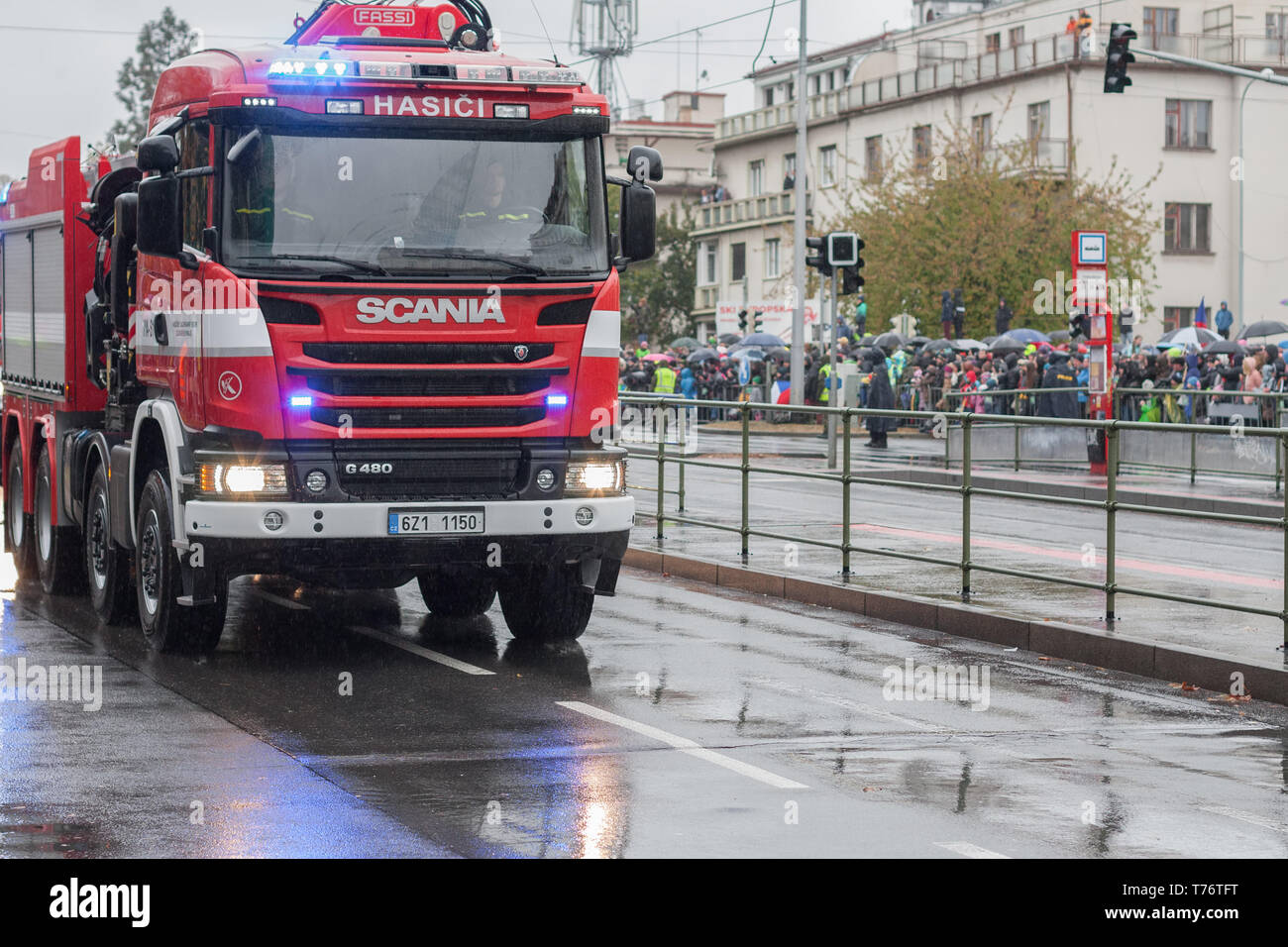 European street, Prague-October 28, 2018: Fire brigade workers are ...