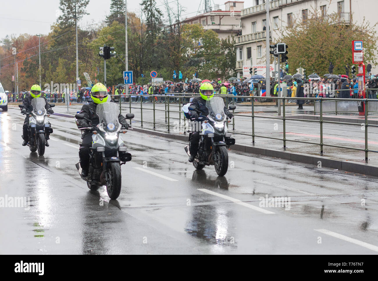 European street, Prague-October 28, 2018: Police workers are riding ...