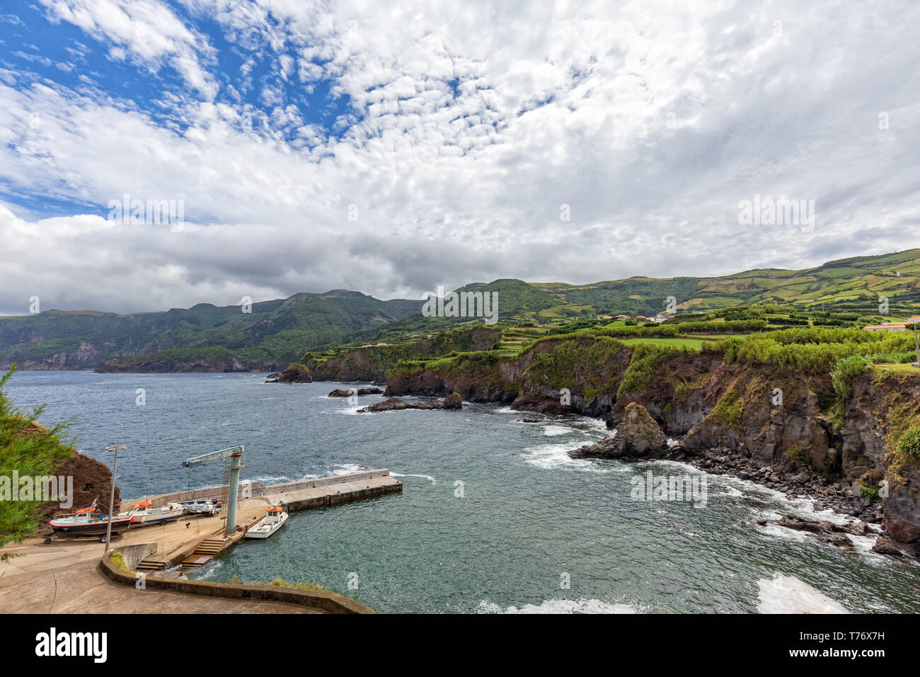 A boat launch and dock in Ponta Delgada on the island of Flores in the ...