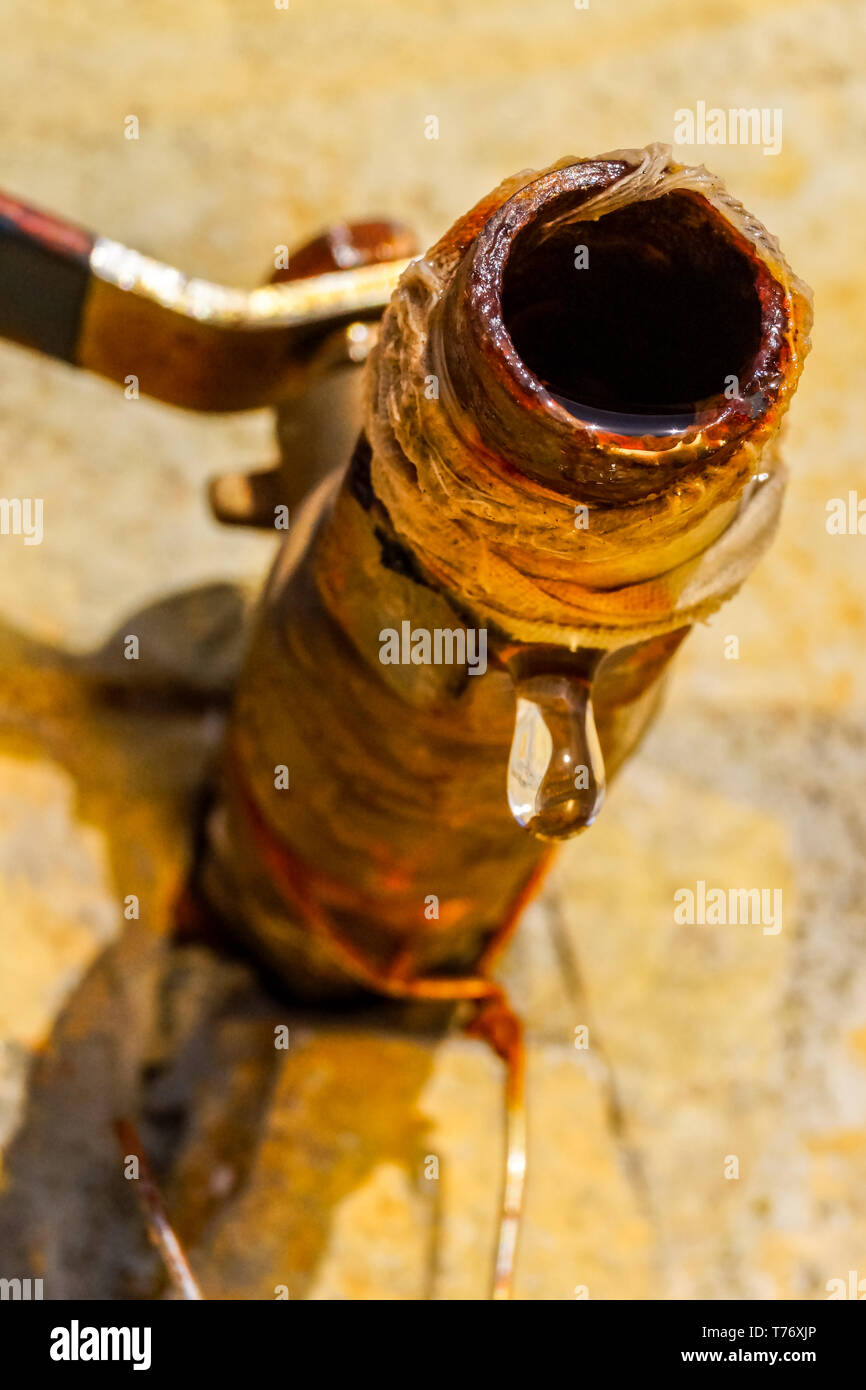 Water drop falling from tap hi-res stock photography and images - Alamy