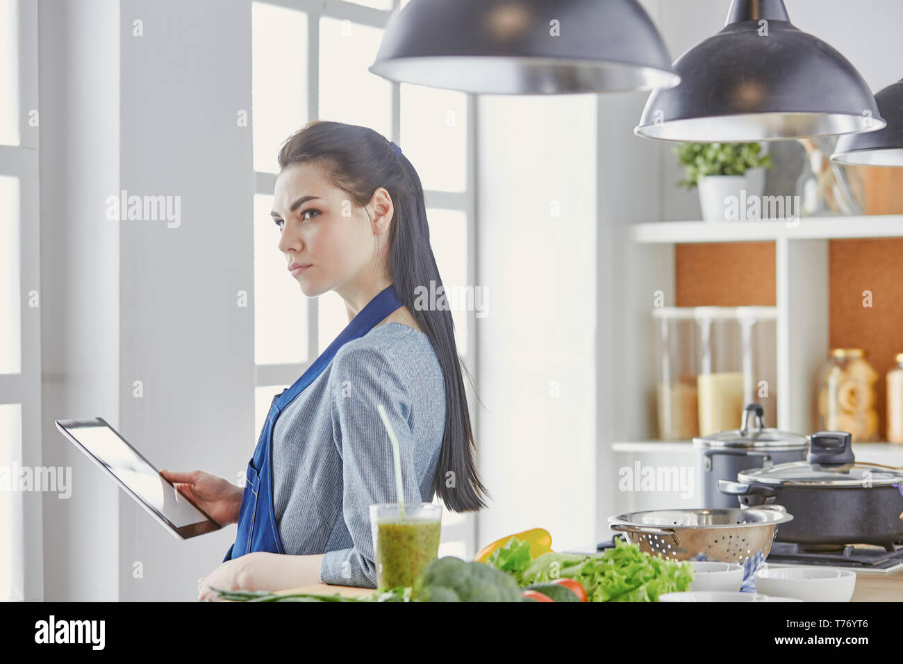 Woman cooking salad recipe hi-res stock photography and images - Alamy