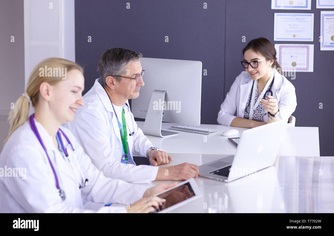 Doctors having a medical discussion in a meeting room Stock Photo - Alamy
