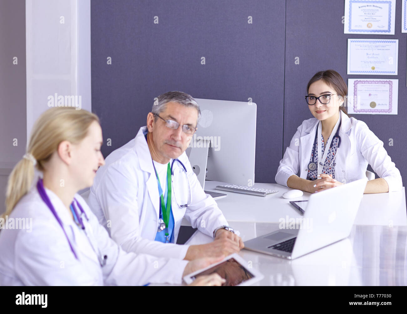 Doctors having a medical discussion in a meeting room Stock Photo - Alamy