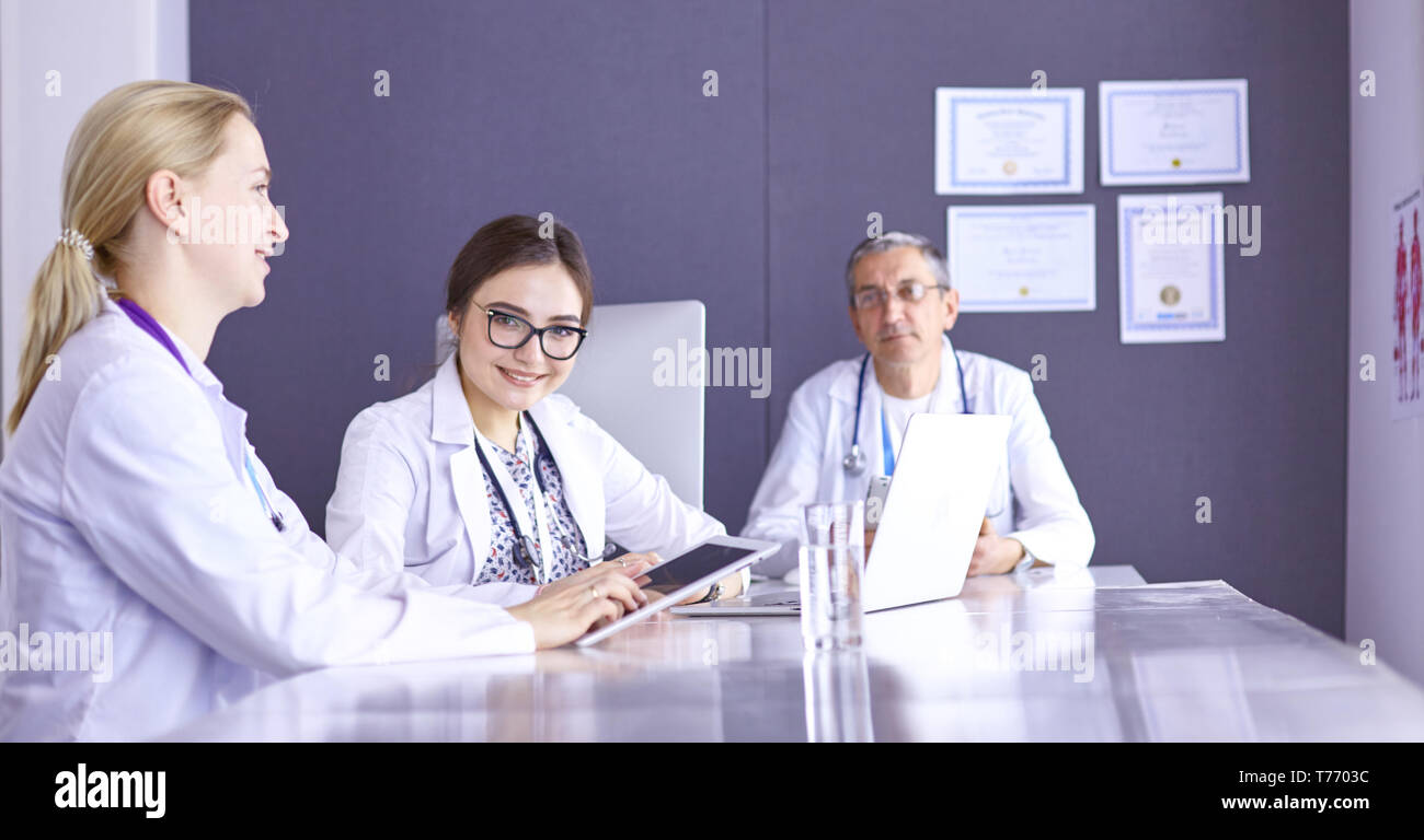 Doctors having a medical discussion in a meeting room Stock Photo - Alamy