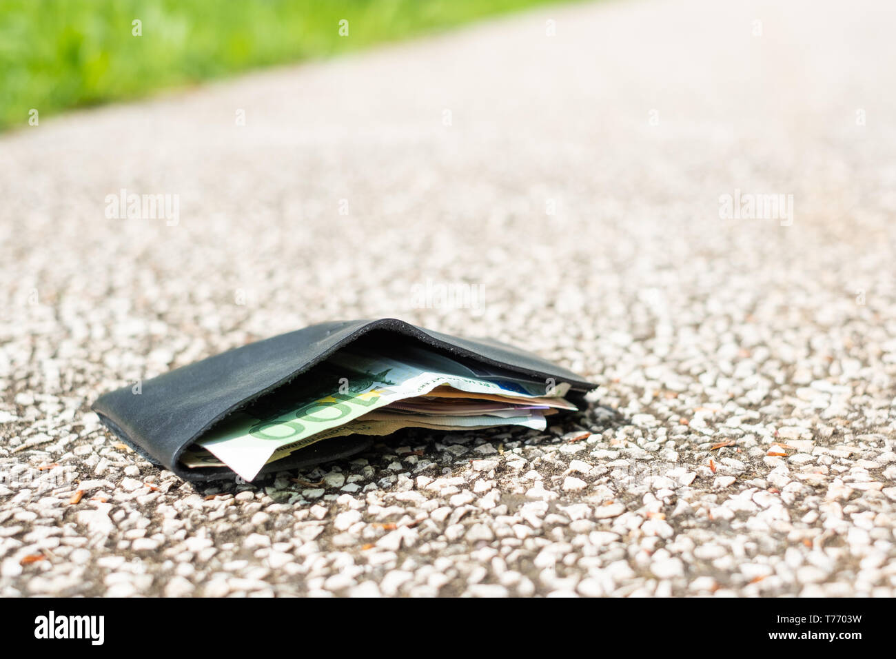 Lost Wallet Lying On Street High Resolution Stock Photography and ...