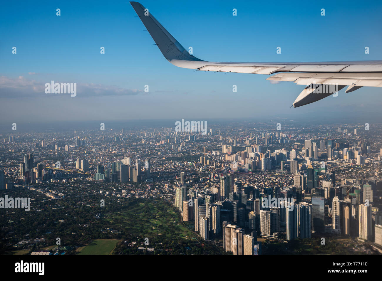 Aerial view of Makati City, Philippines from a window seat Stock Photo ...