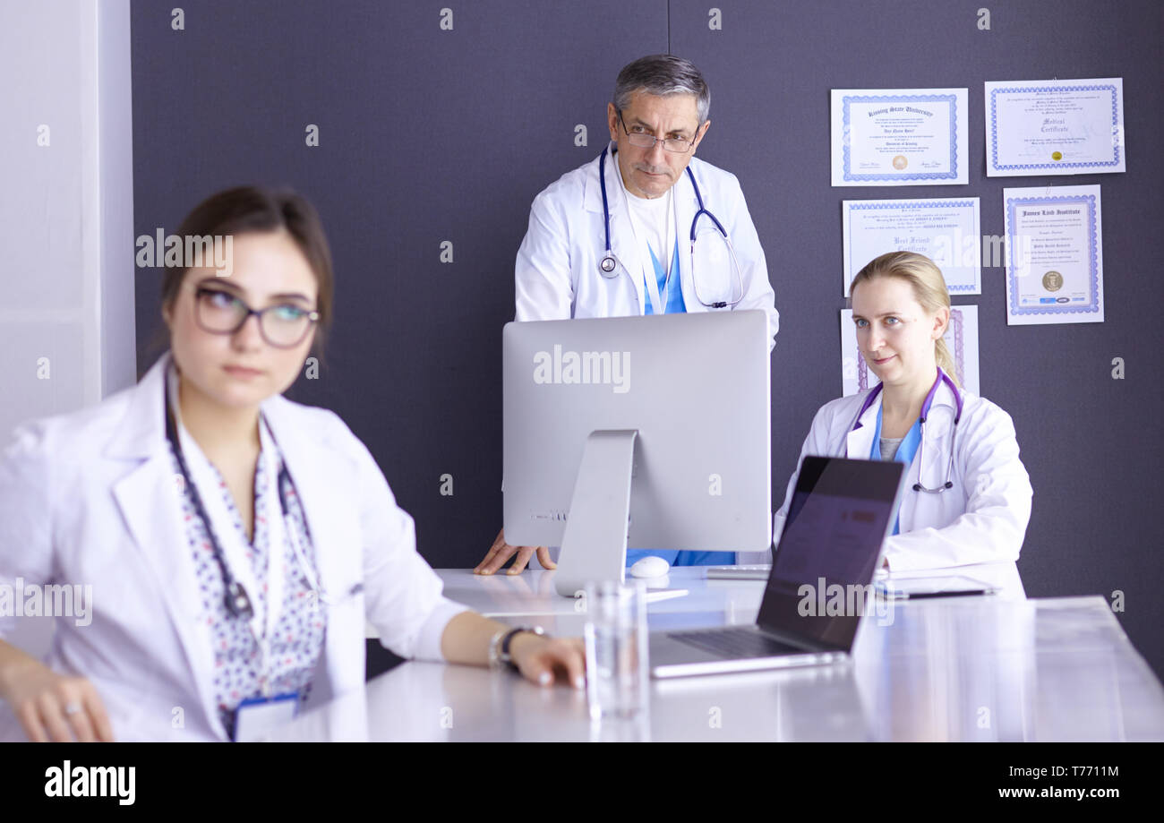 Doctors having a medical discussion in a meeting room Stock Photo - Alamy