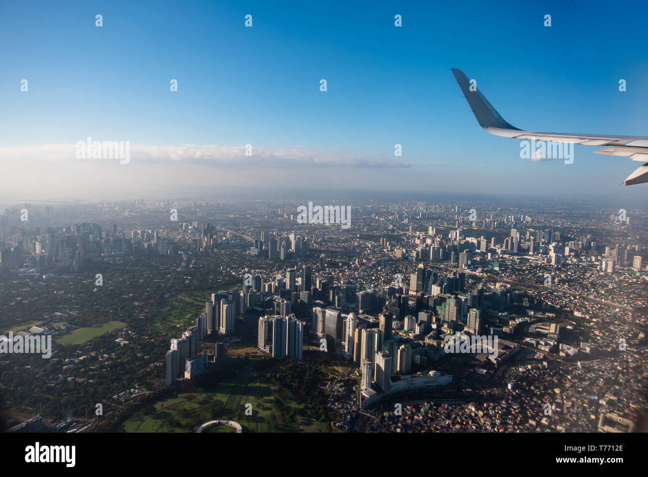 Aerial view of Makati City, Philippines from a window seat Stock Photo ...