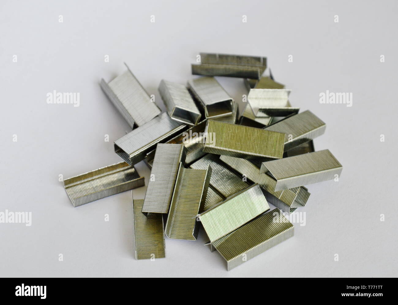 stapler wire for refill on white background Stock Photo - Alamy