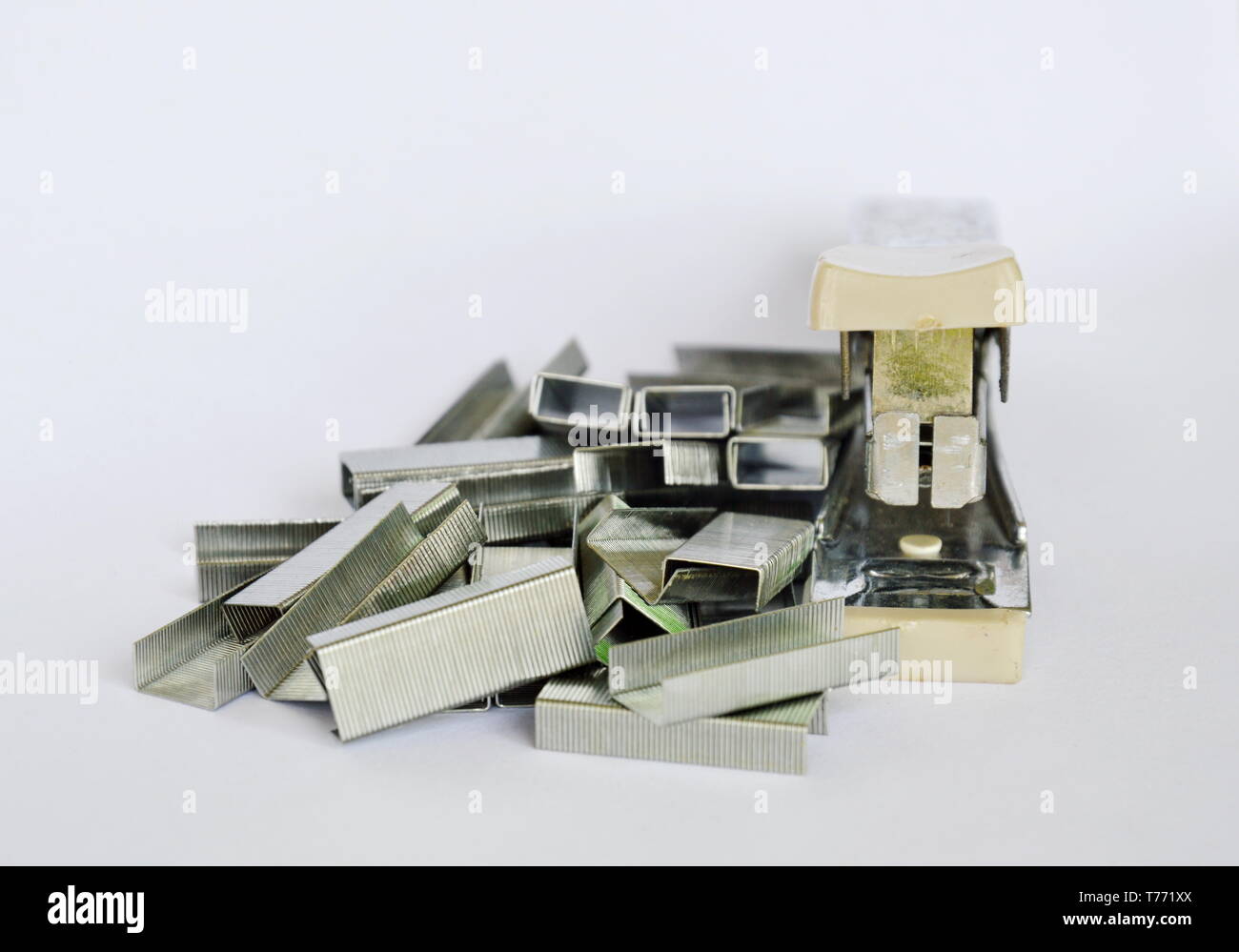 stapler and refill wire on white background Stock Photo - Alamy