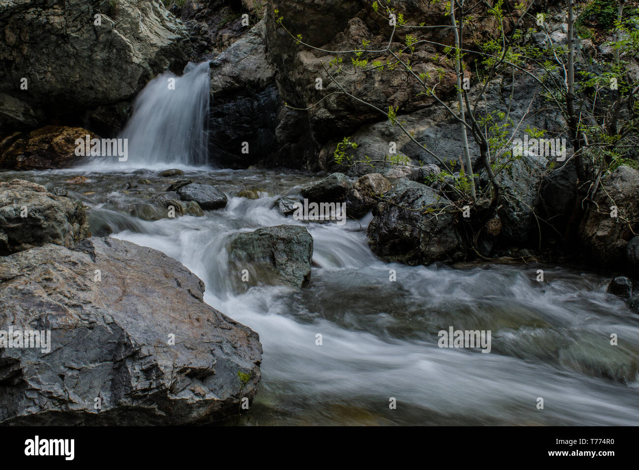 A beautiful little waterfall on the climbing path of darakeh Stock ...