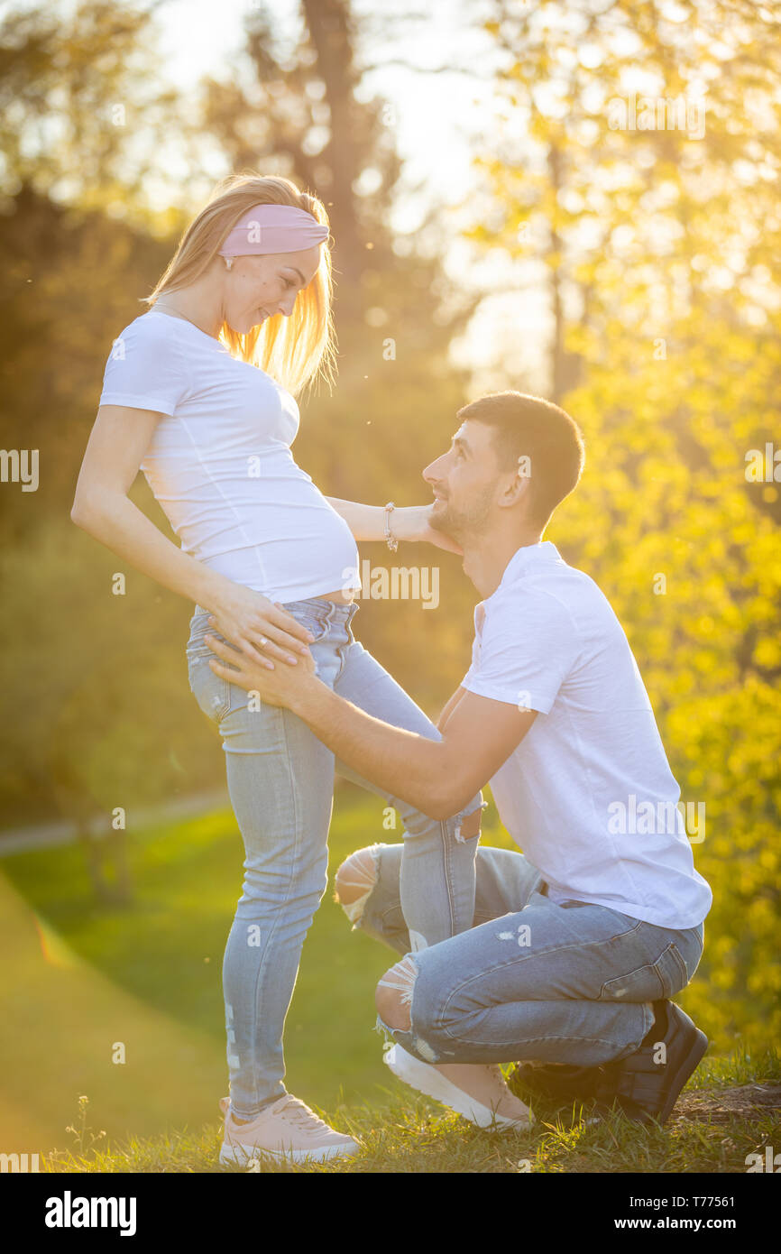 Happy couple expecting baby, pregnant woman with husband, young family ...