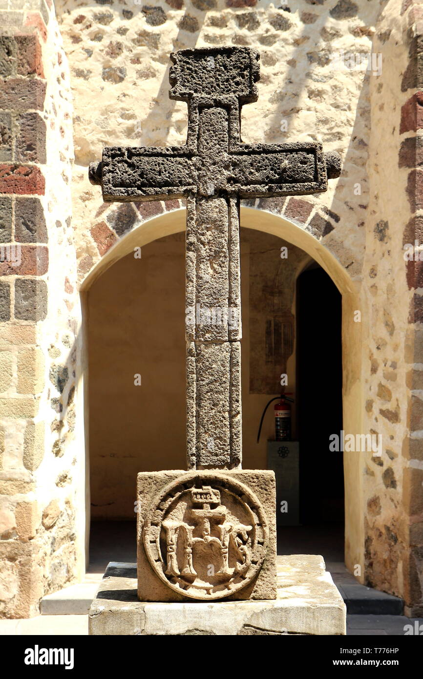 Christian cross in the Former Saint Augustin Monastery of Acolman. Ex ...