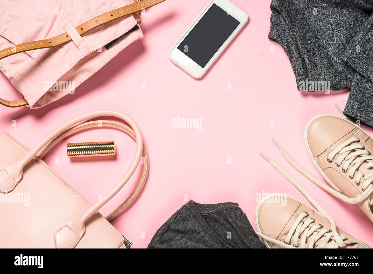 Woman fashion cloth and accessories on pink background Stock Photo - Alamy