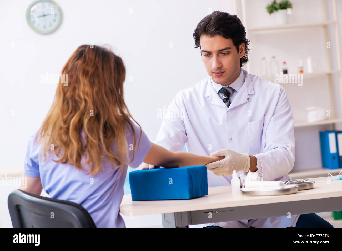 Female patient during blood test sampling procedure Stock Photo - Alamy