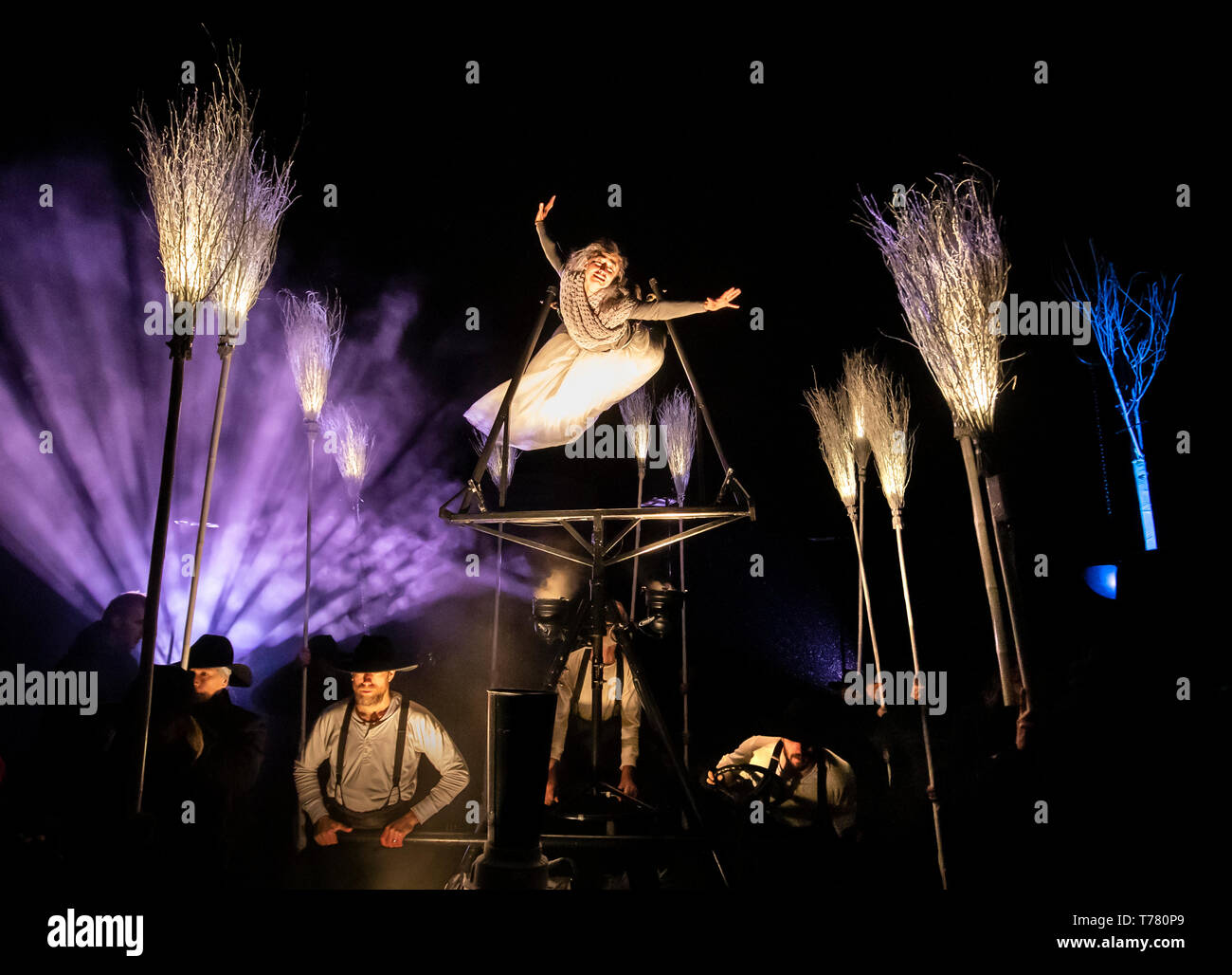 An artist performs during 'The Witching Hour', a large-scale immersive ...