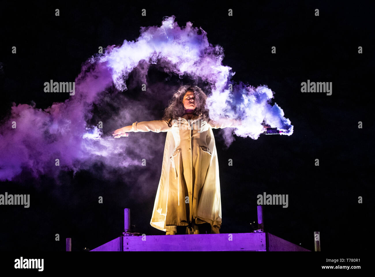 An artist performs during 'The Witching Hour', a large-scale immersive ...