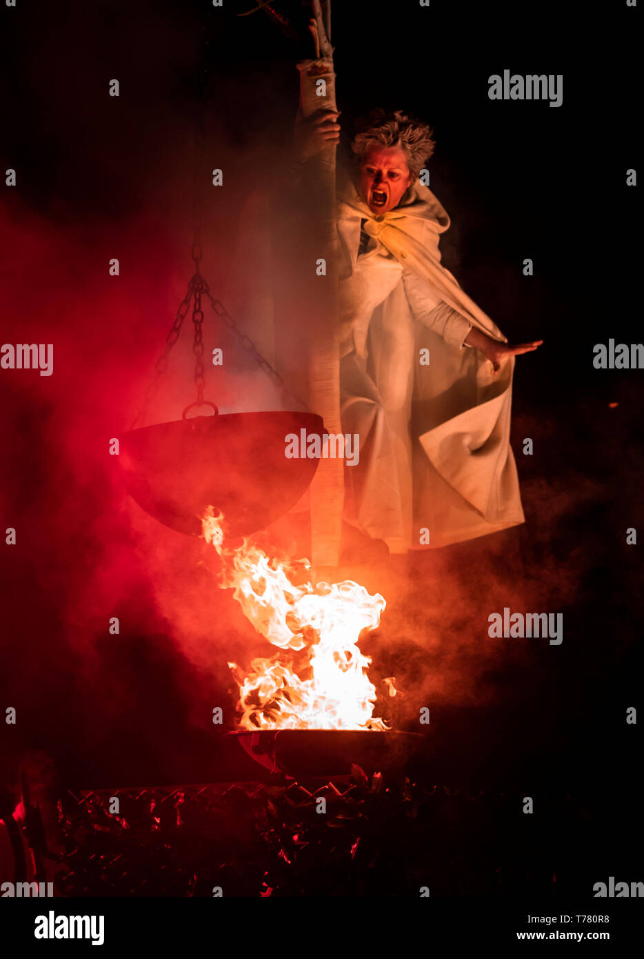 An artist performs during 'The Witching Hour', a large-scale immersive ...