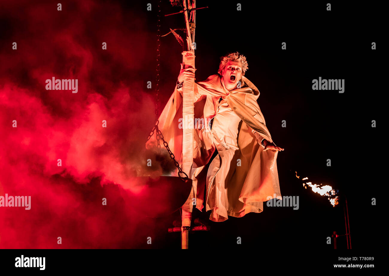 An artist performs during 'The Witching Hour', a large-scale immersive ...