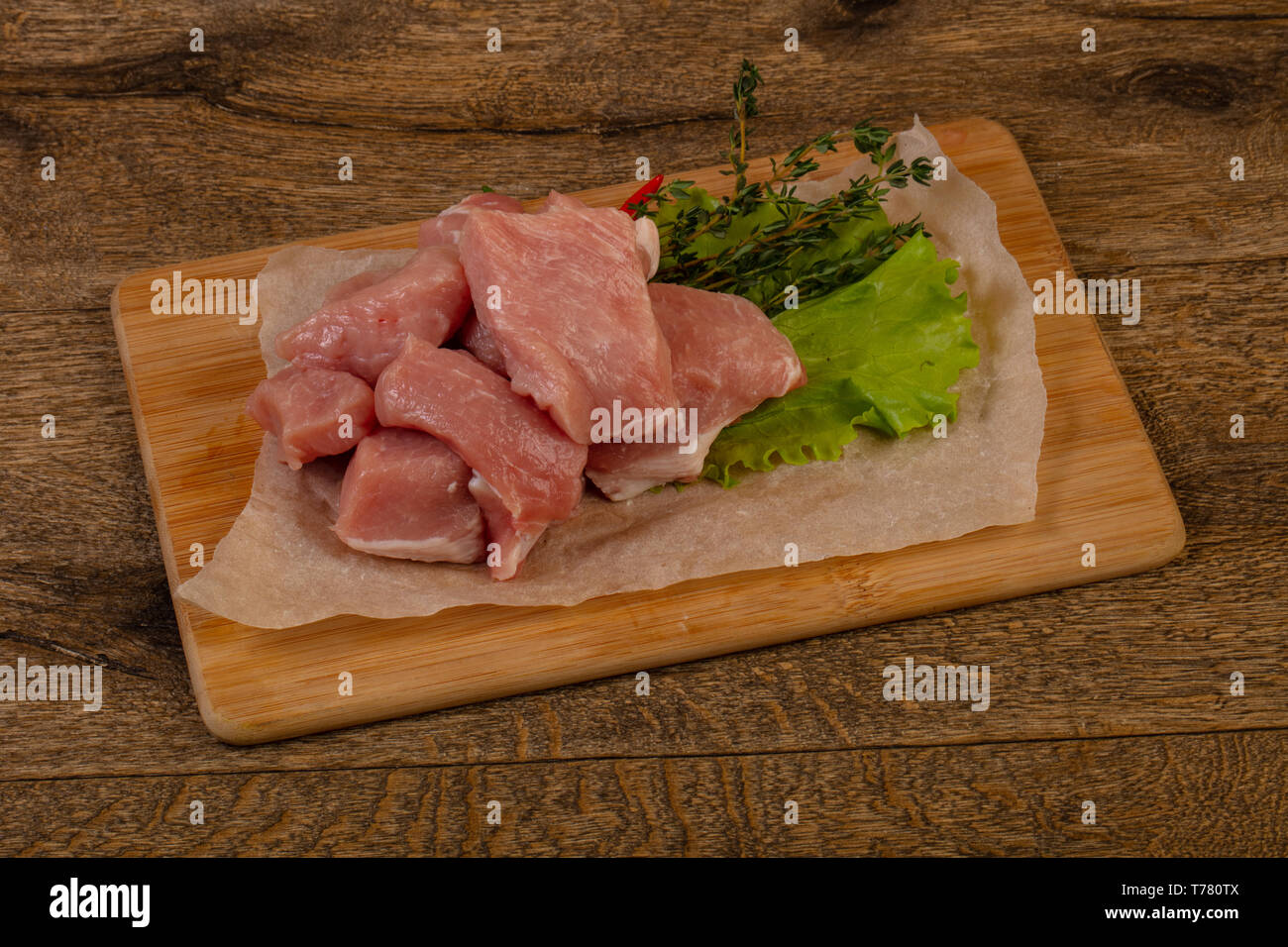 Raw pork meat heap for roast Stock Photo - Alamy