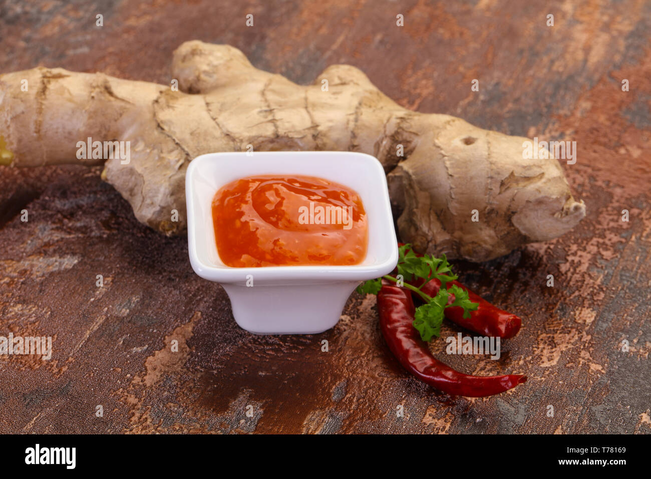 Ginger chili sauce with root and pepper Stock Photo - Alamy
