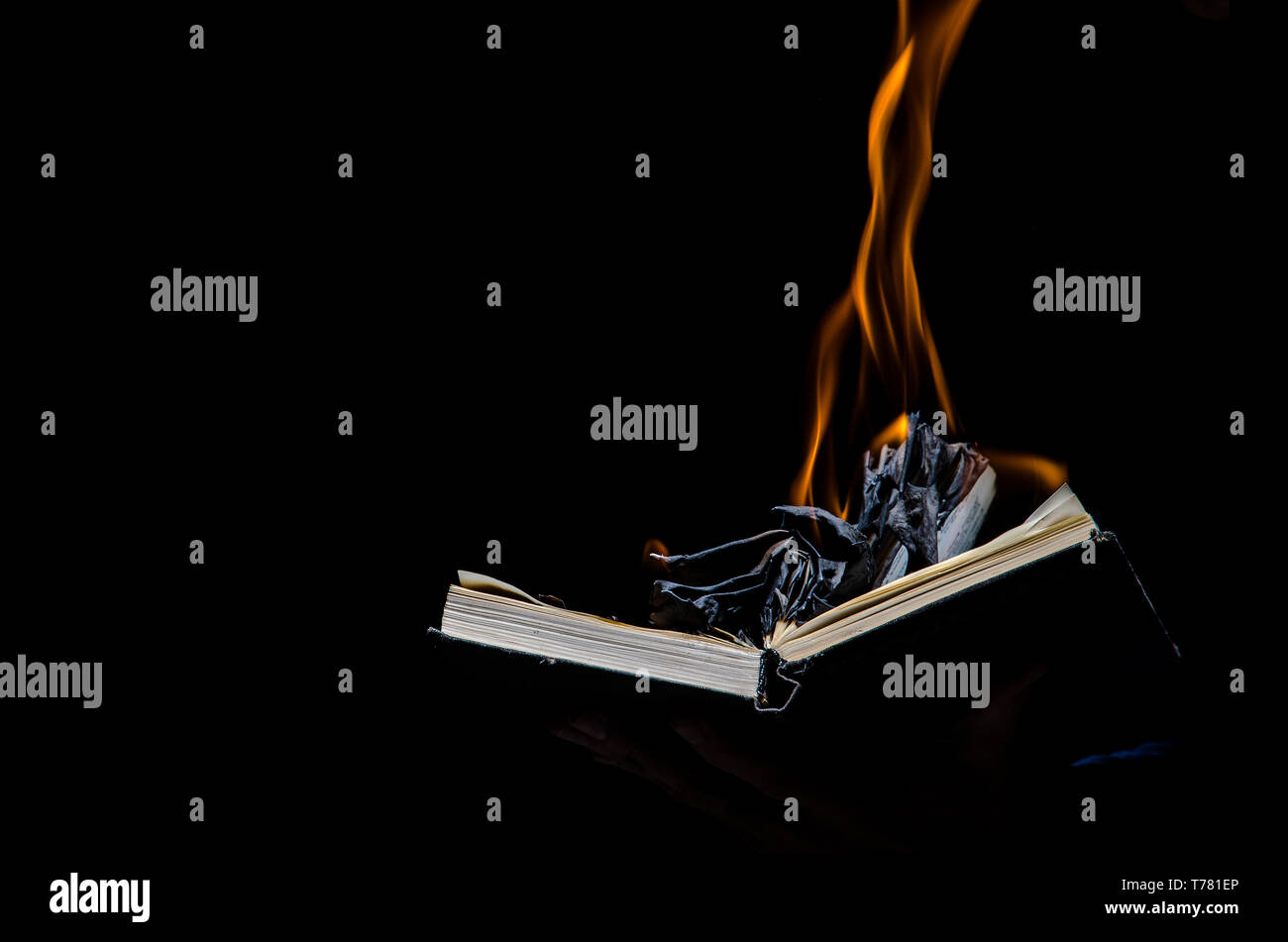 Burning book hi-res stock photography and images - Alamy
