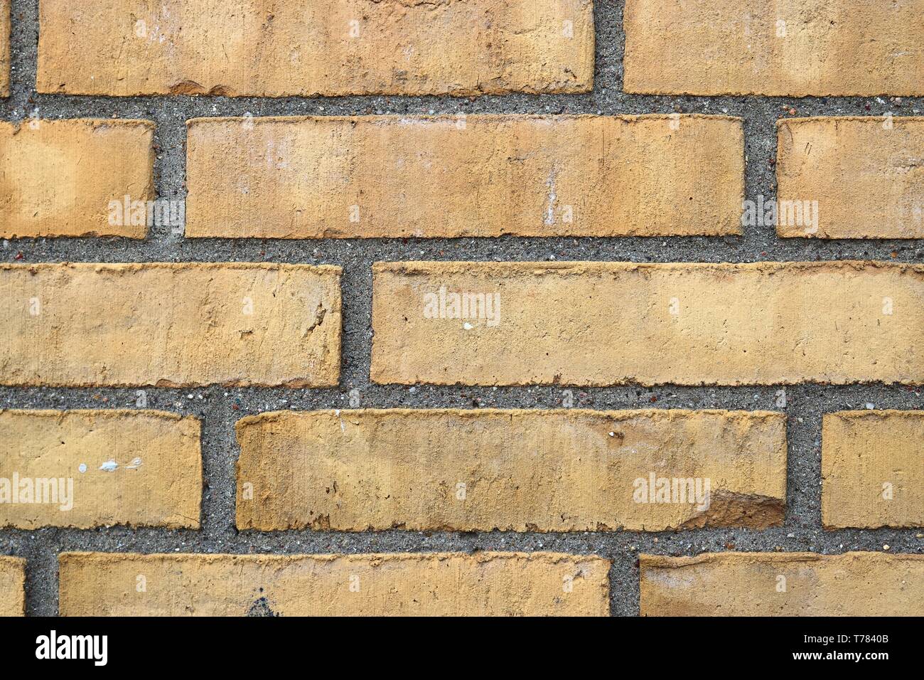 High resolution close up aged and weathered brick walls with red and ...