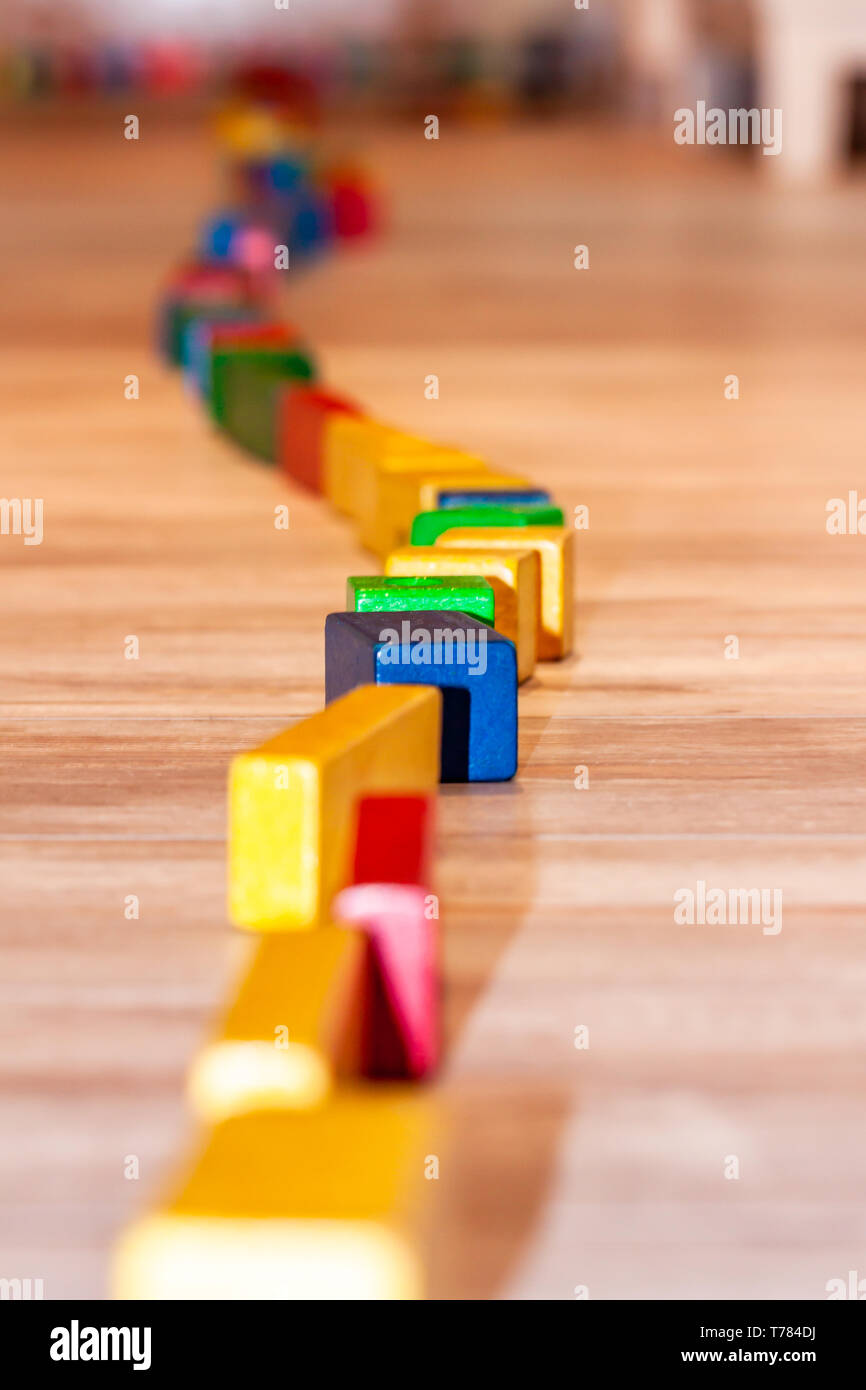 Finger pushing dominoes hi-res stock photography and images - Alamy