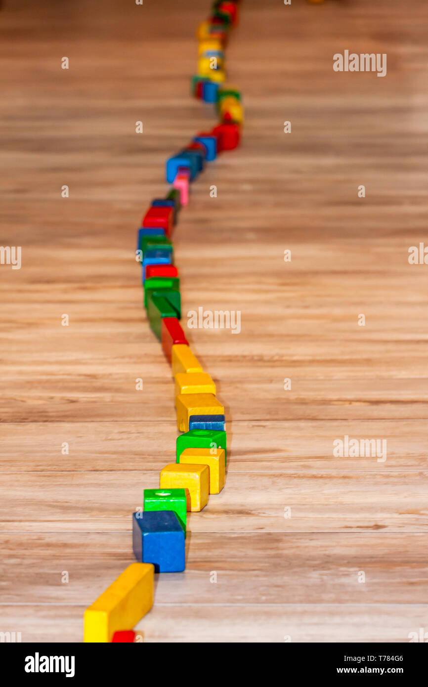 Finger pushing dominoes hi-res stock photography and images - Alamy