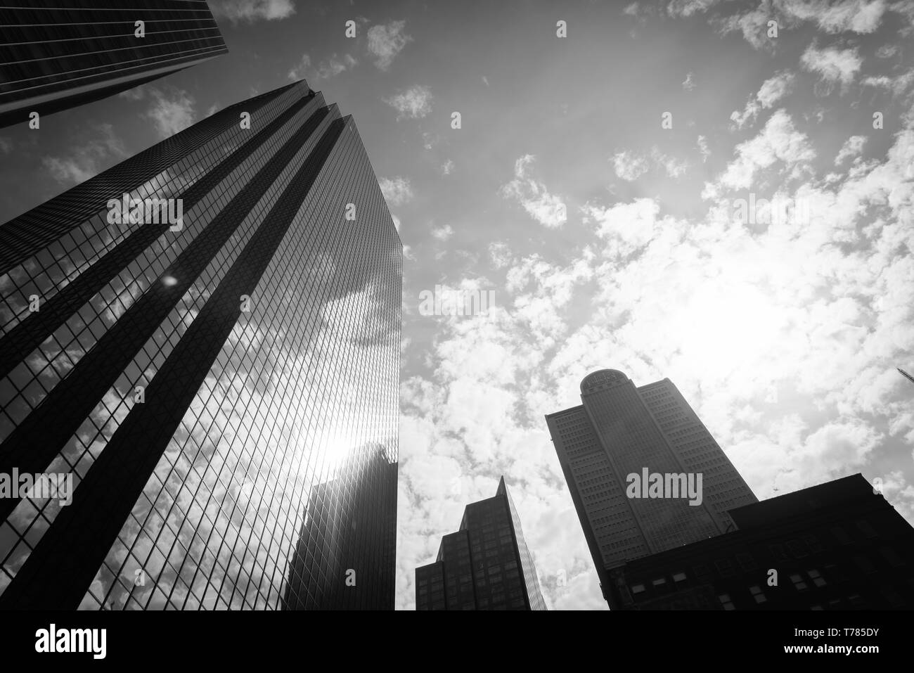 Filtered tone low perspective angle view of Dallas skylines with cloud ...