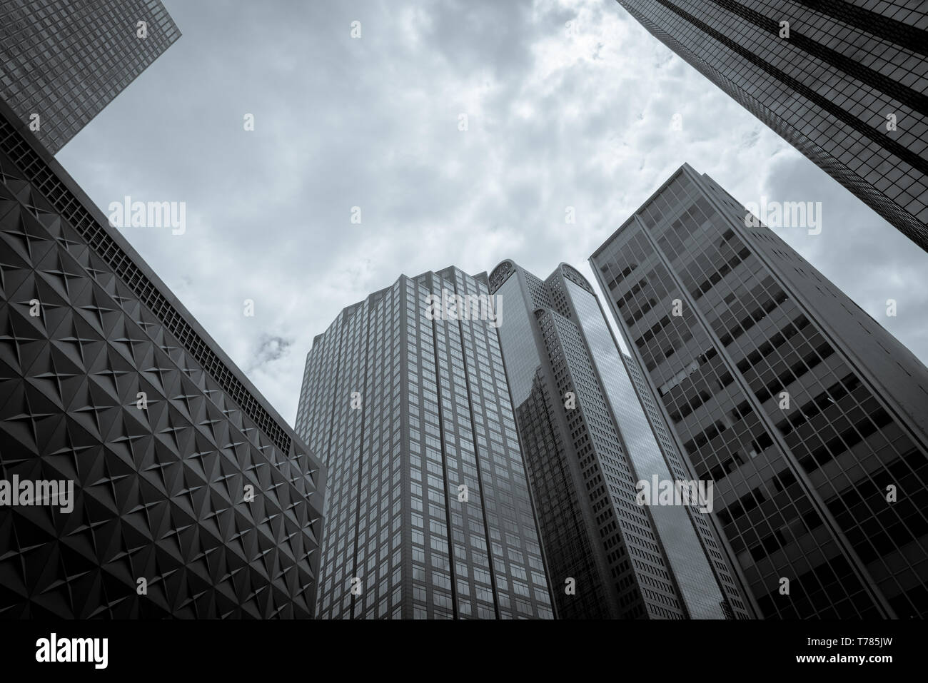 Filtered tone low perspective angle view of Dallas skylines with cloud ...