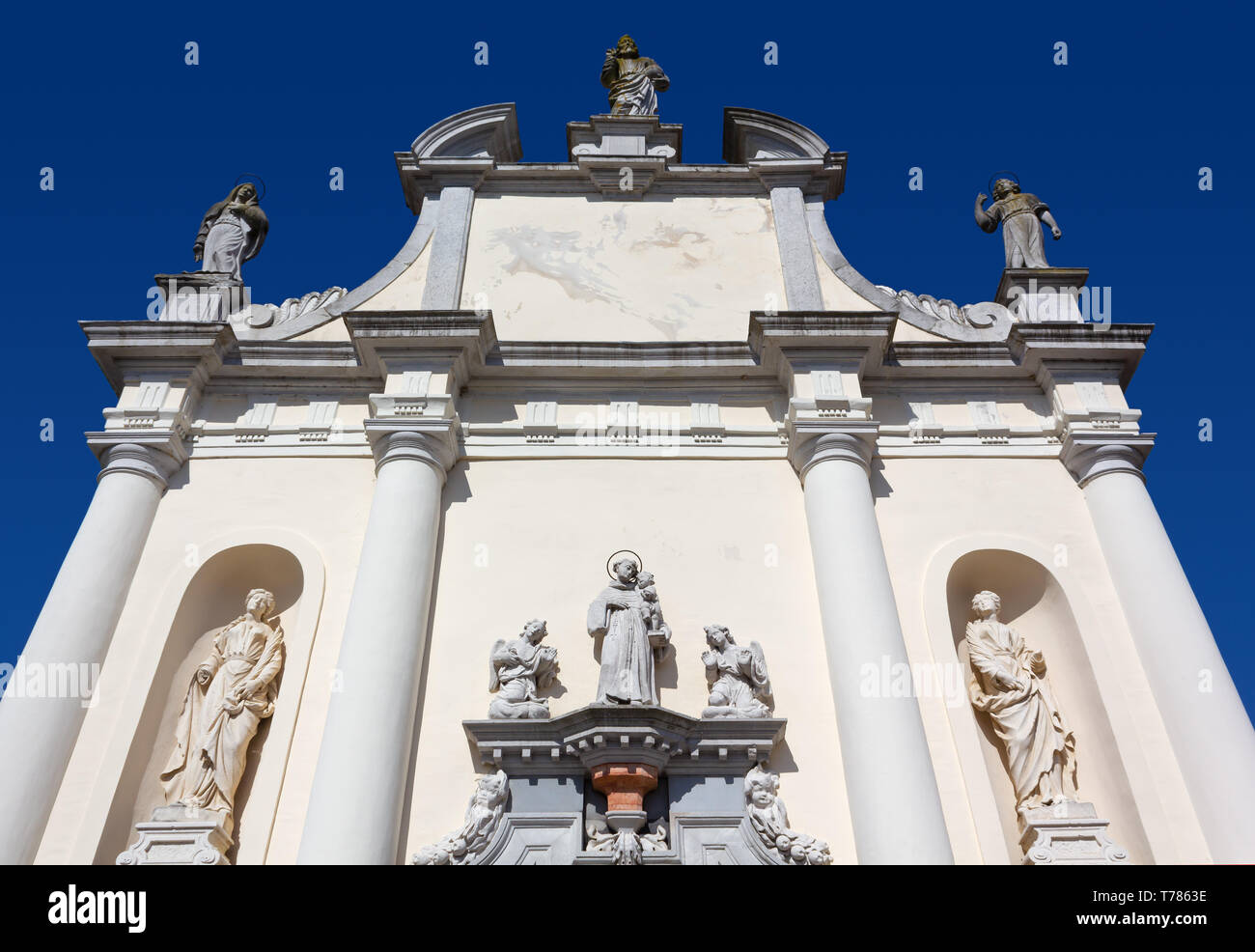 Facade of the small baroque Saint Anthony church in Aquileia, Italy ...