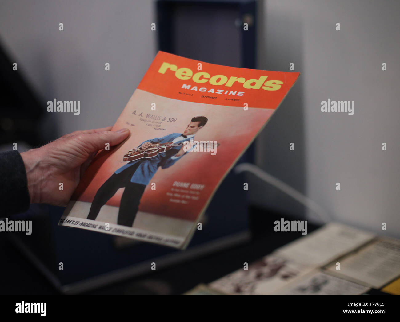 A visitor holding a copy of records magazine - Decca's publicity ...