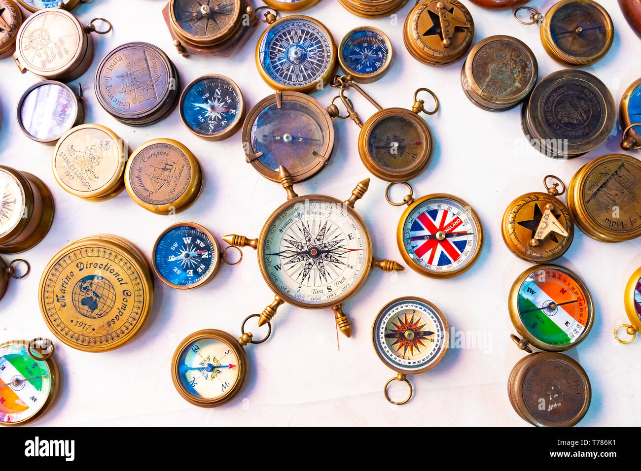 Beautiful and colorful vintage compasses, travel background Stock Photo ...