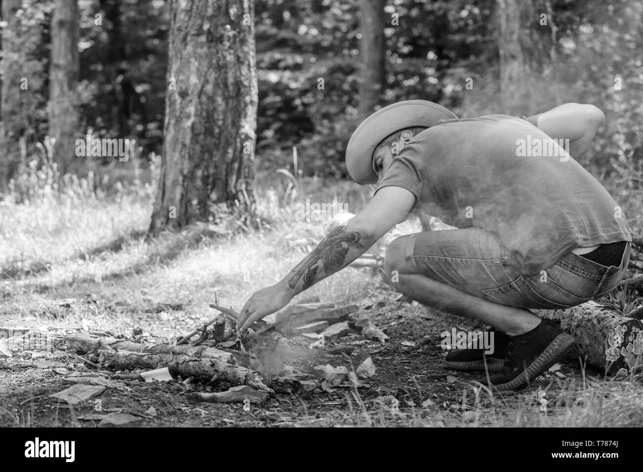 Ultimate guide to bonfires. Arrange the woods twigs or wood sticks ...