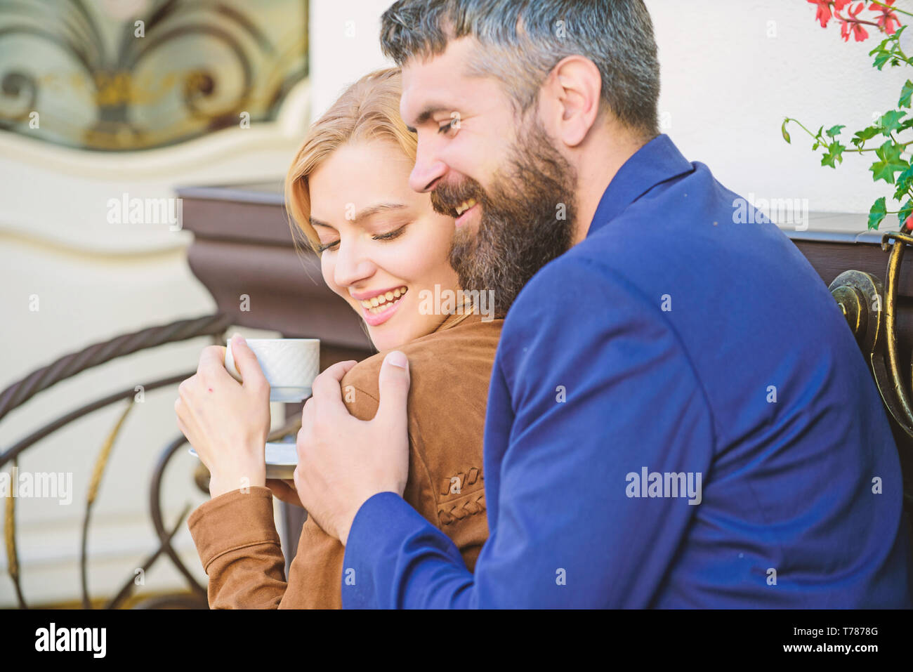 Couple cuddling in cafe girl hi-res stock photography and images - Alamy