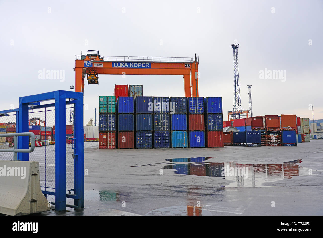 KOPER, SLOVENIA -12 APR 2019- View of cargo freight containers piled ...