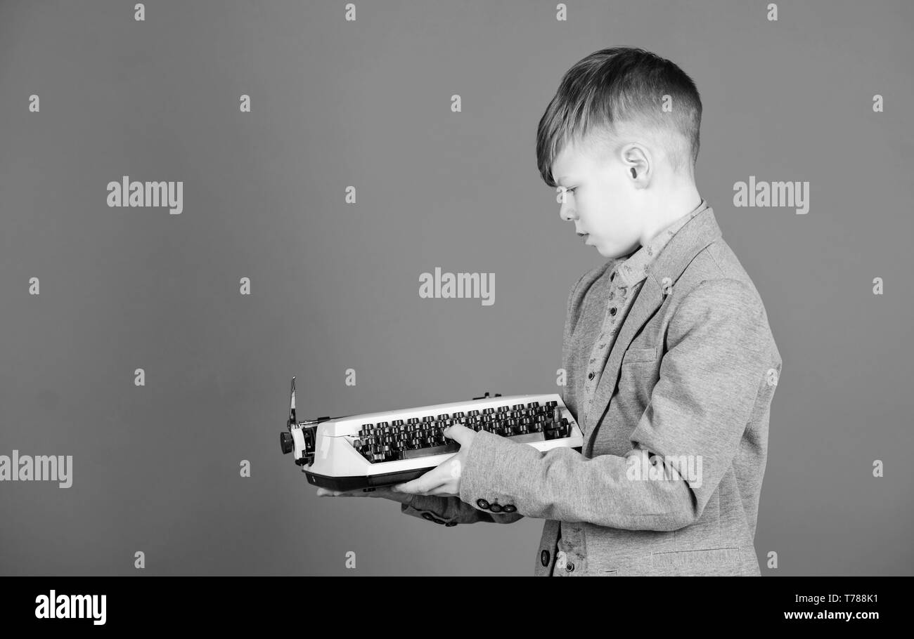How does a retro typing machine work. Smart child using retro ...