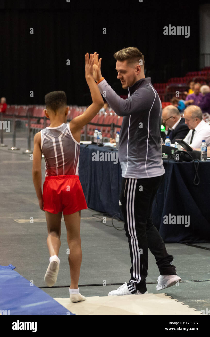 Telford, England, UK. 27 April, 2018. A male gymnast from Revolution ...