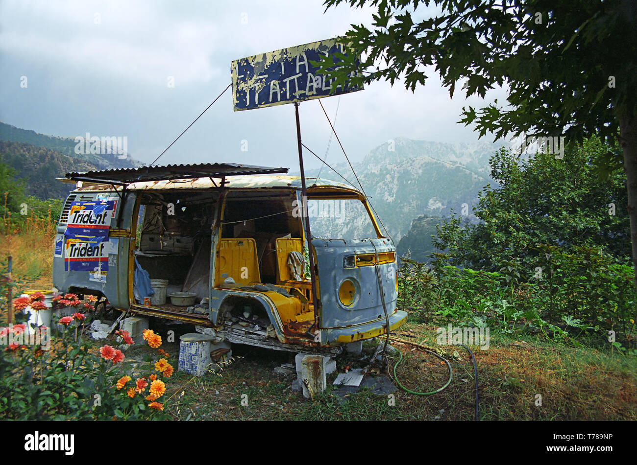 View of a wrecked and abandoned VW van in the Taïyettos Mountains near ...